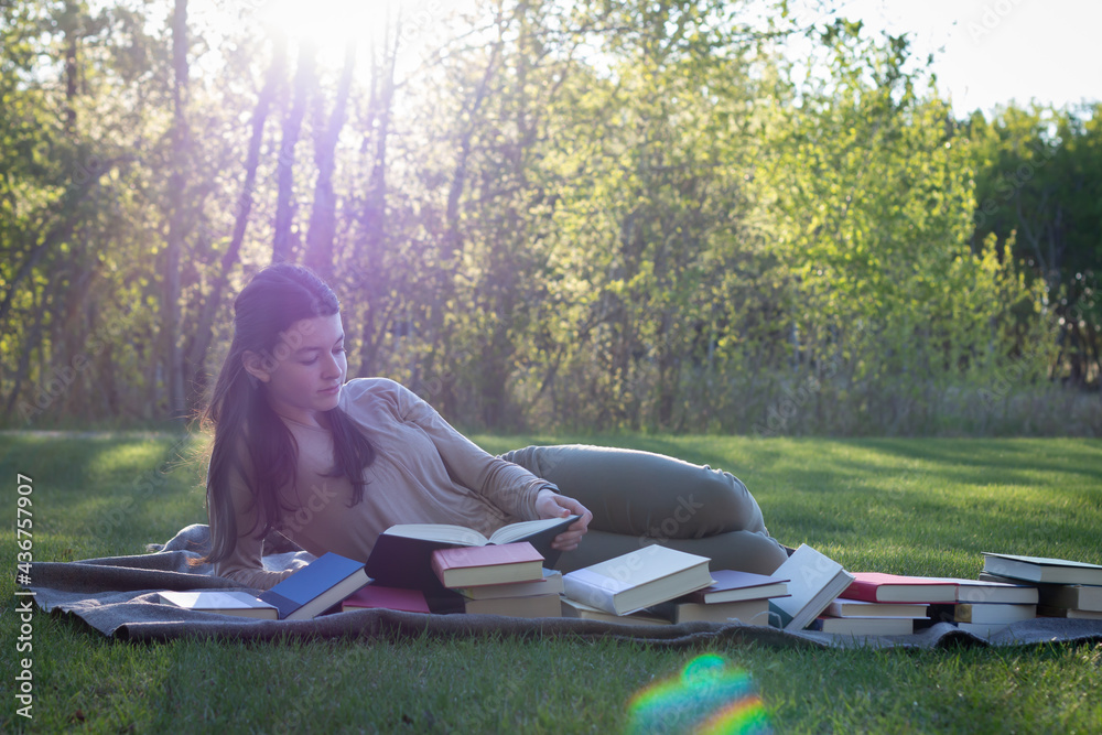 Woman Reading A Book Outside