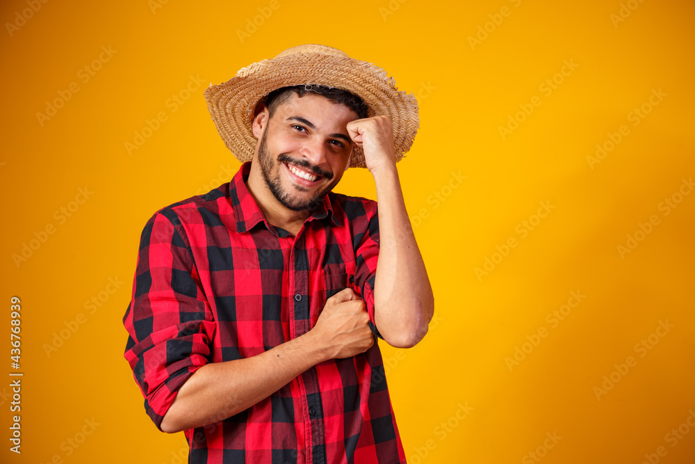 Brazilian man wearing typical clothes for the Festa Junina, Dancing and ...