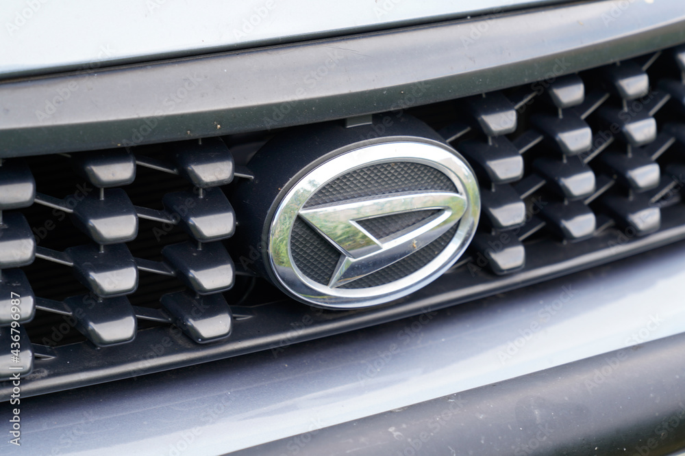 Daihatsu logo sign and text brand on front car suv terios Stock Photo ...