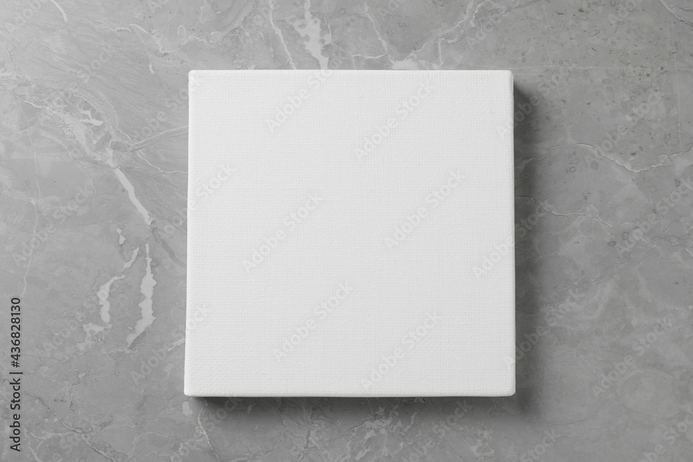 Blank canvas on grey marble table, top view. Space for text Stock Photo ...