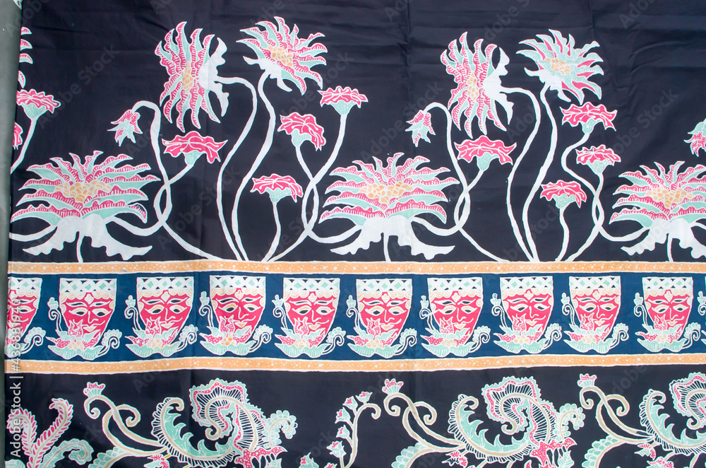 Batik is the art of painting cloth using wax and natural or artificial ...