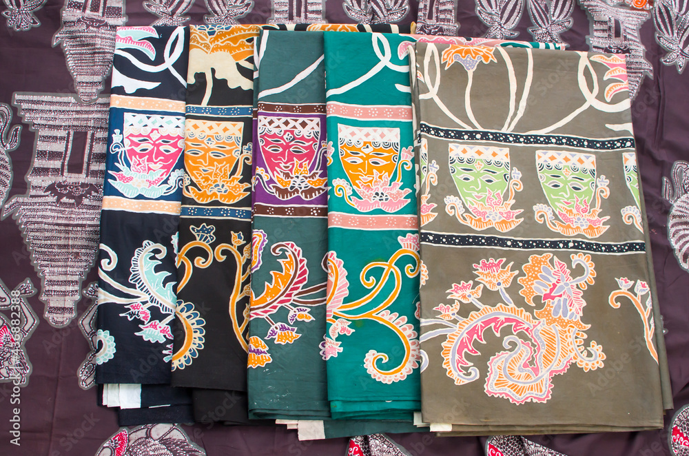 Batik is the art of painting cloth using wax and natural or artificial ...