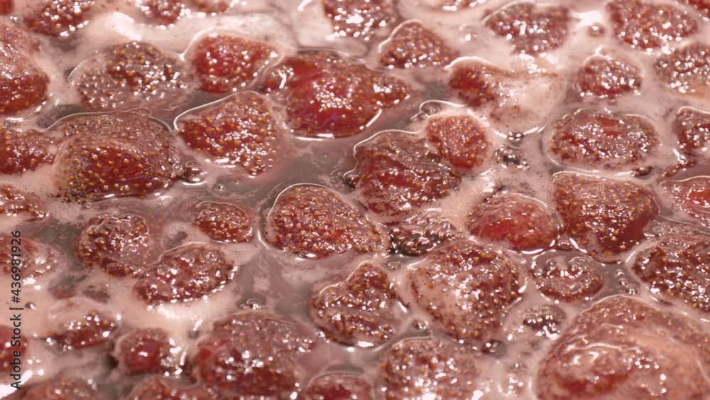 Strawberry jam. Homemade Strawberry jam in making progress boiling ...