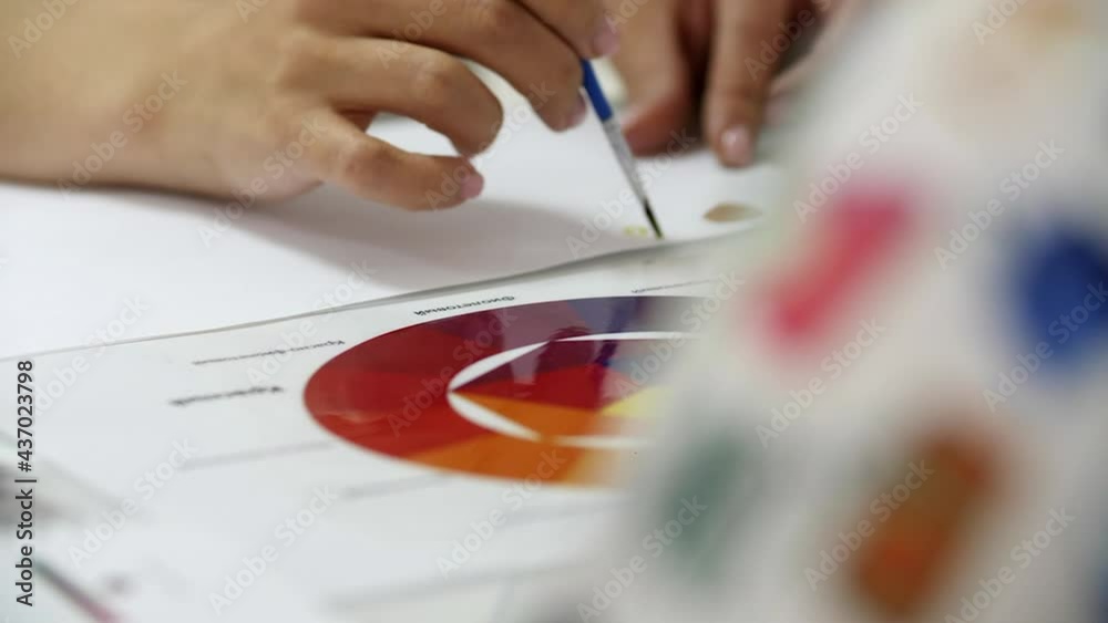 Teacher explains to the student the basics of color theory. Color ...