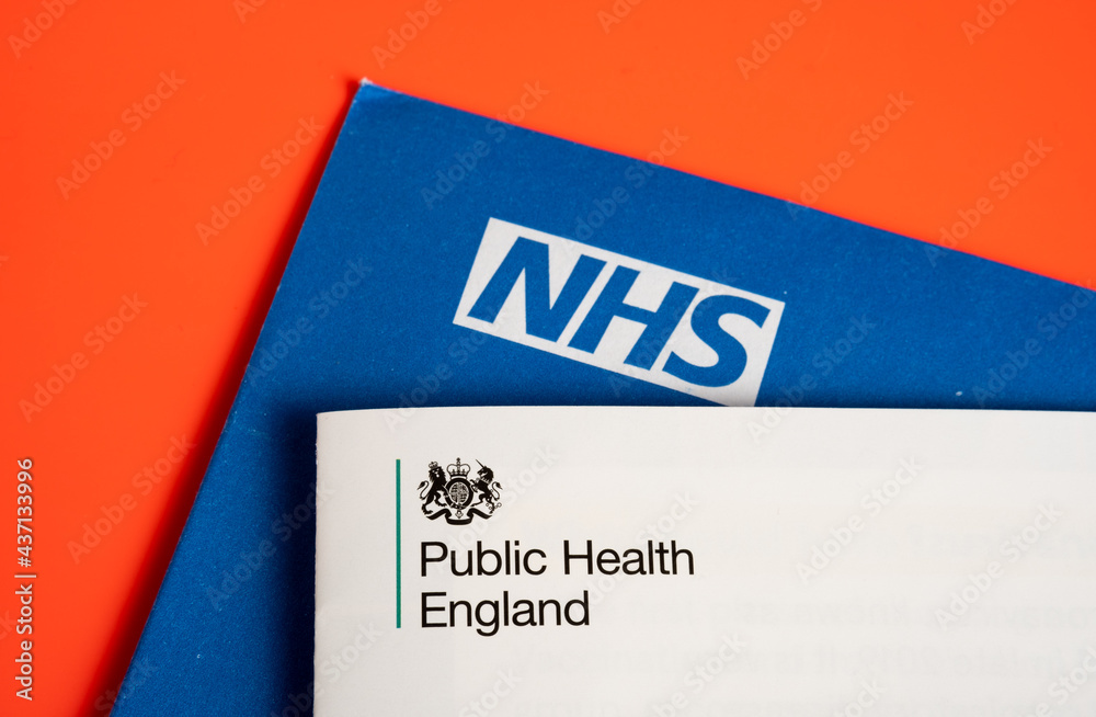 Public Health England logo seen on COVID vaccination brochure and NHS ...
