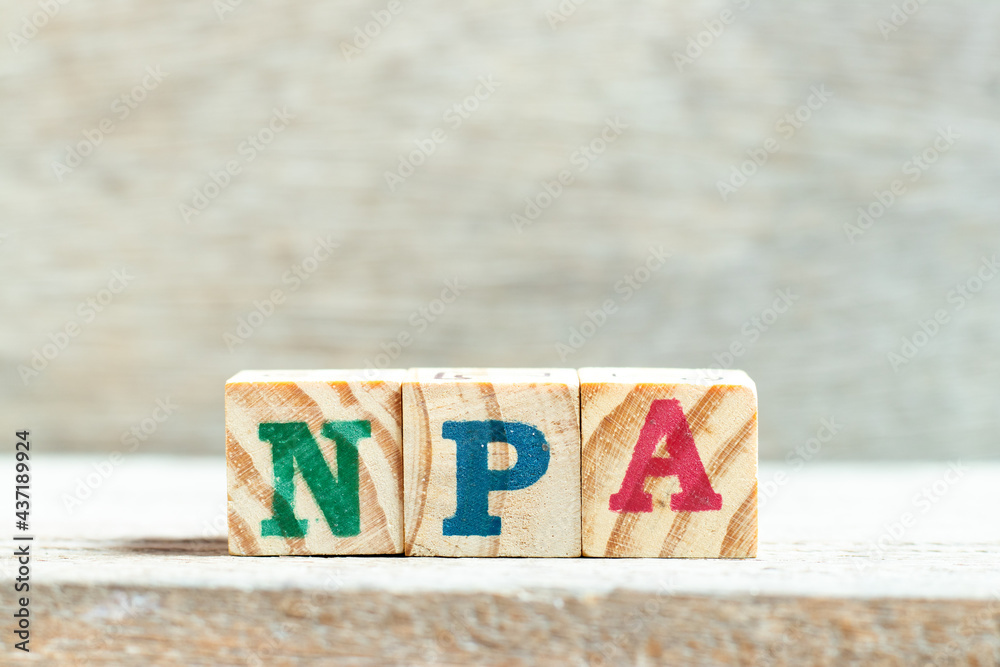 Alphabet letter block in word NPA (Abbreviation of Non performing ...