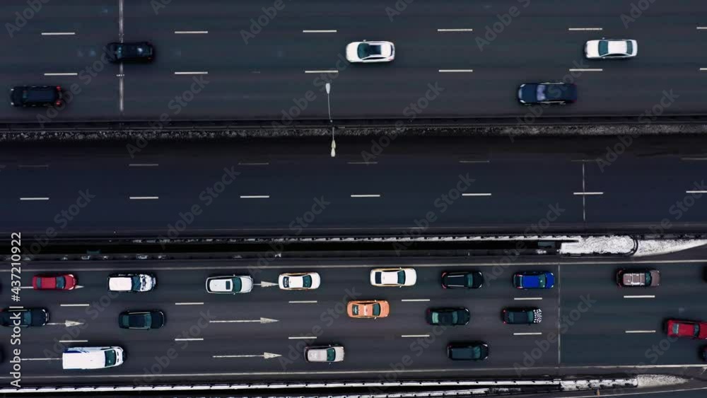Top view drone shot of huge road with multi-lane road, many cars moving ...