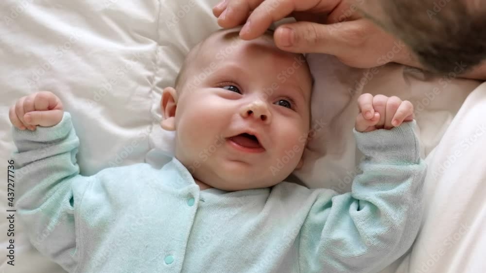 Stockvideo Father with his Daughter, tiny infant. Newborn baby smiling ...