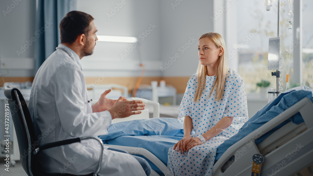 Hospital Ward: Sitting on Bed Caucasian Female Patient Listens to ...