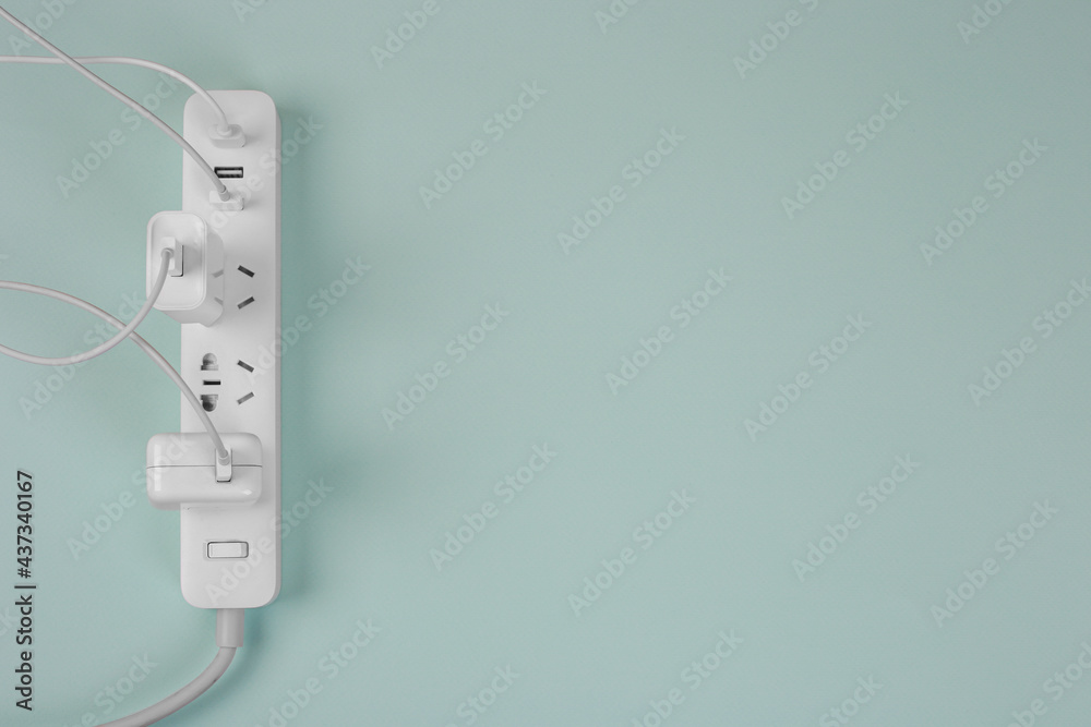 Stylish white electric extender with sockets on tiffany background ...