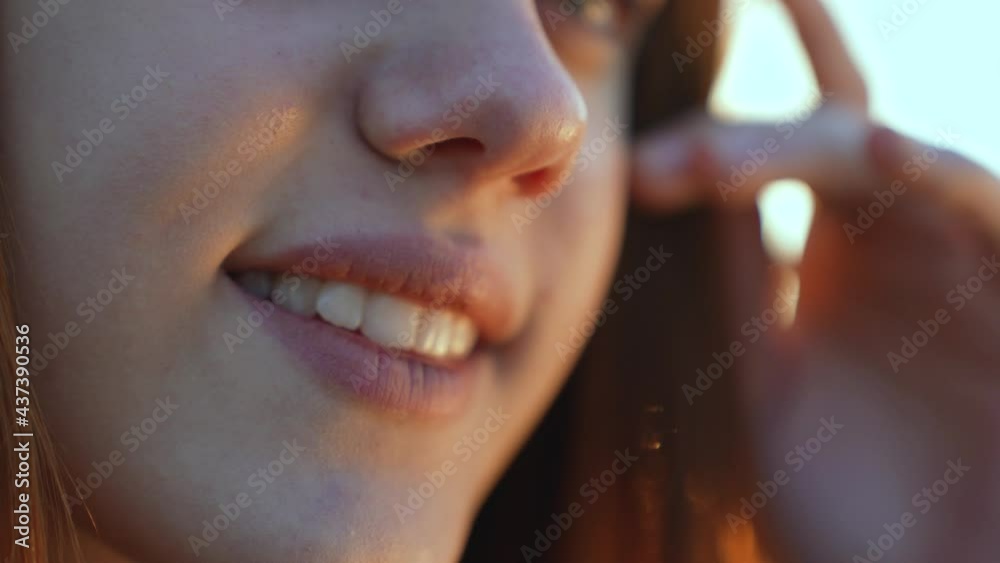 Girl face at sunset. Girl of dreaming. Lips smile. Girl face in wind ...