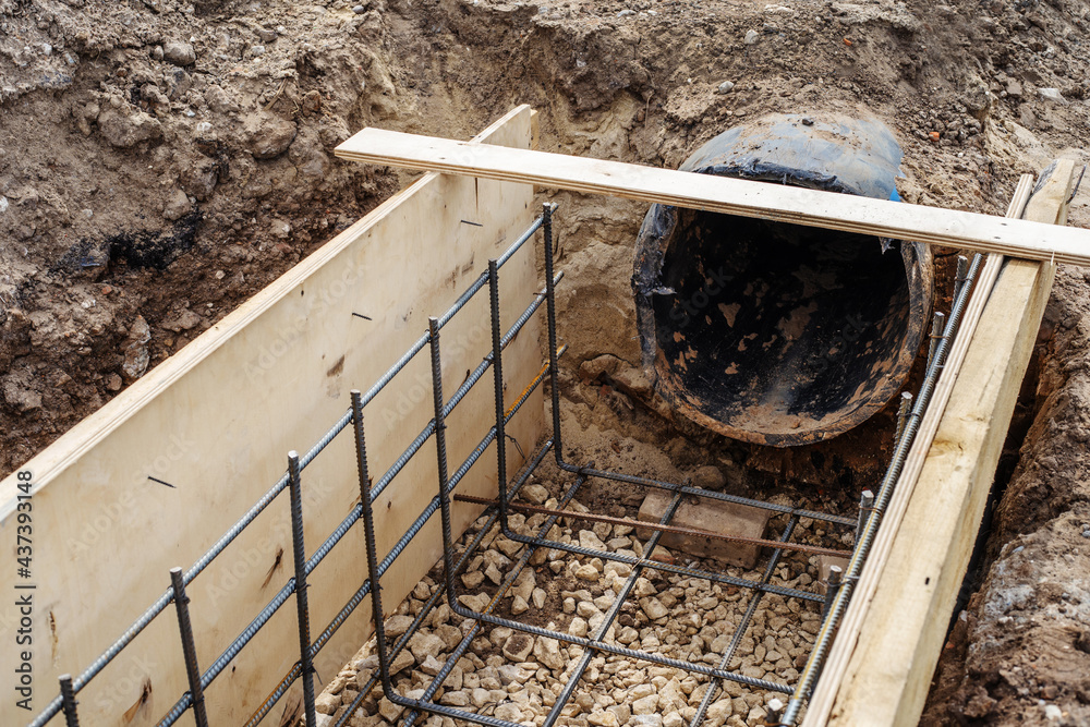 Drainage system construction. A fragment of a stormwater drainage pipe ...