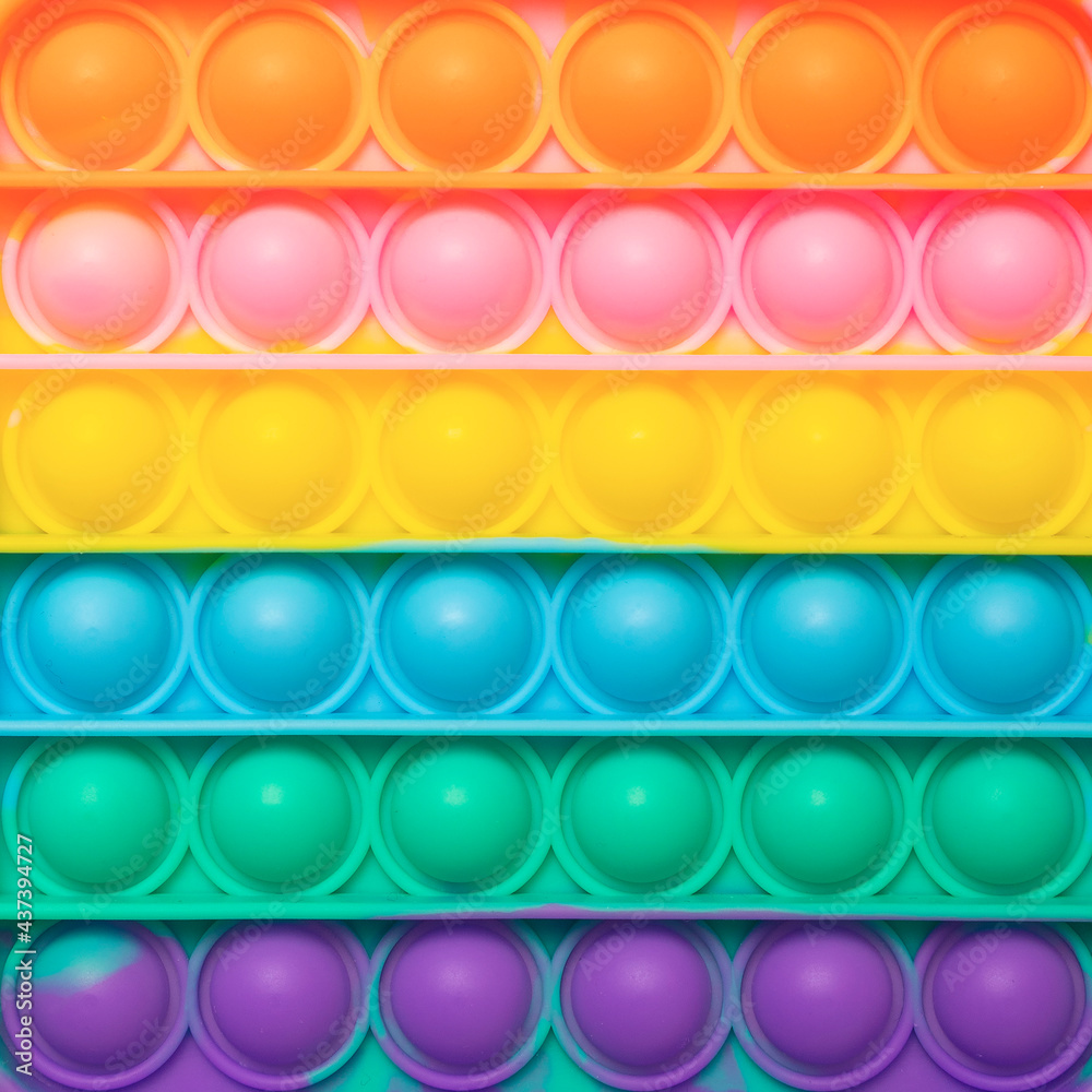 Background of trendy Pop it fidget toy. Simple dimple texture Stock ...