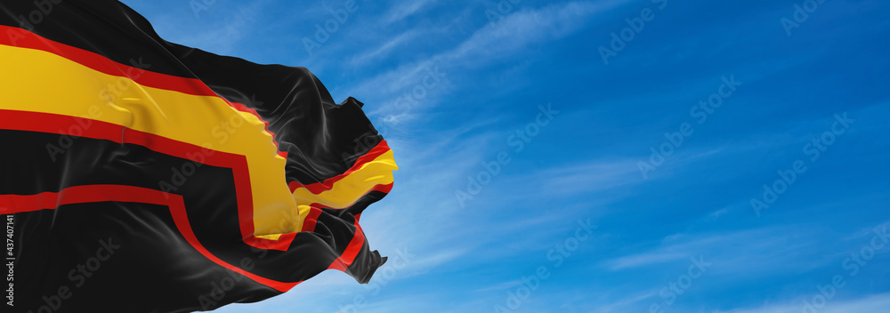 Rubber Fetish Pride flag waving in the wind at cloudy sky. Freedom and ...