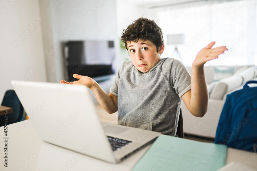 bored and sad teen student after hard work with computer Stock Photo ...