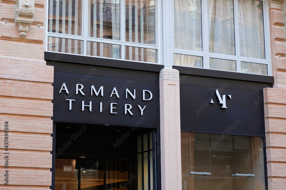 armand Thierry boutique facade of clothing shop with text brand and ...