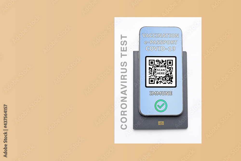 The digital vaccination e-passport with the QR code on the screen of a ...