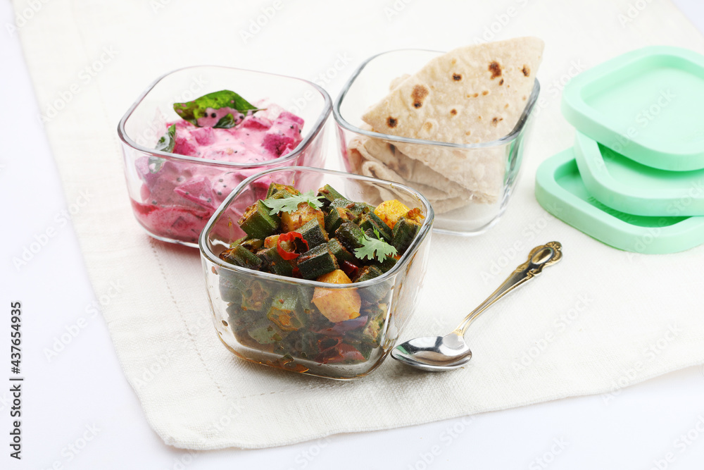beetroot raitha, chapati, roti, or Indian flatbread with aloo bhindi in ...