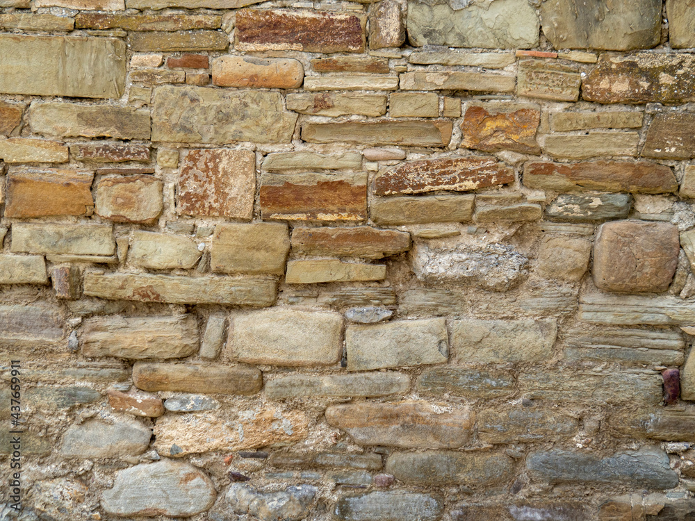Texture rubble masonry made of uneven stone bricks. Background of the ...