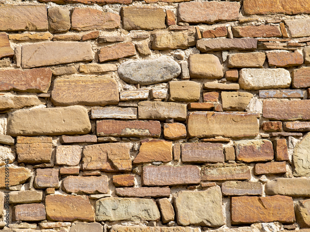 Texture rubble masonry made of uneven stone bricks. Background of the ...