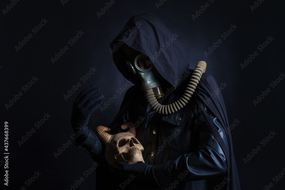 post-apocalyptic angel of death with a demon skull in his arms, a scary ...