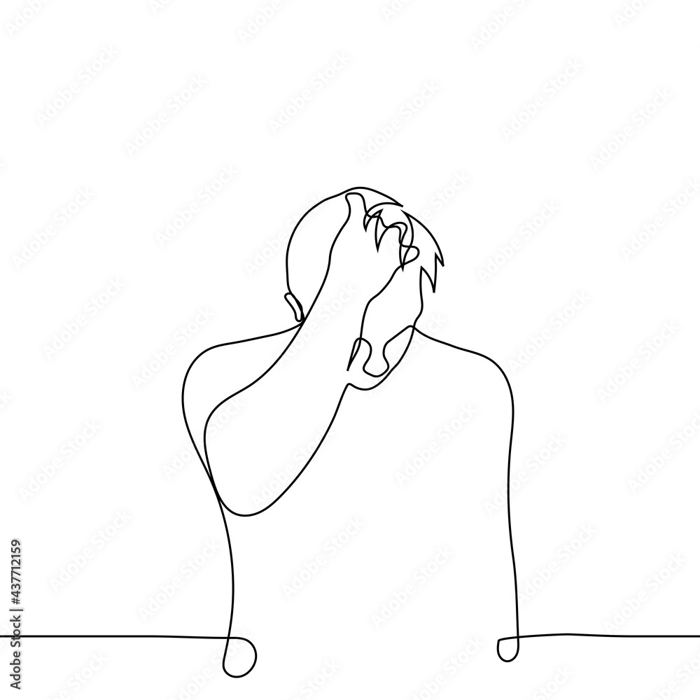 man runs his hand through his hair, his head is slightly lowered - one ...