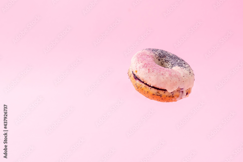 Tempting donuts dessert with iceing and sprinkles. Sweet sugar round ...