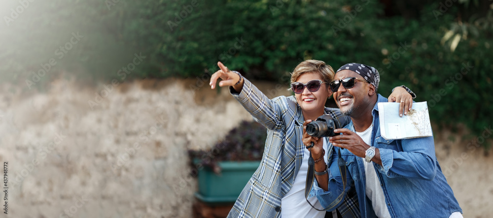 Happy Moments. Cheerful dark skin couple Taking shoot On camera While ...