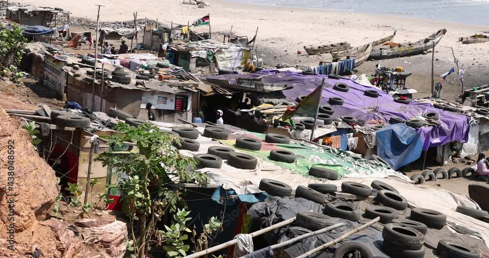 Accra Ghana fishing village poor shacks on ocean. Historic ancient ...