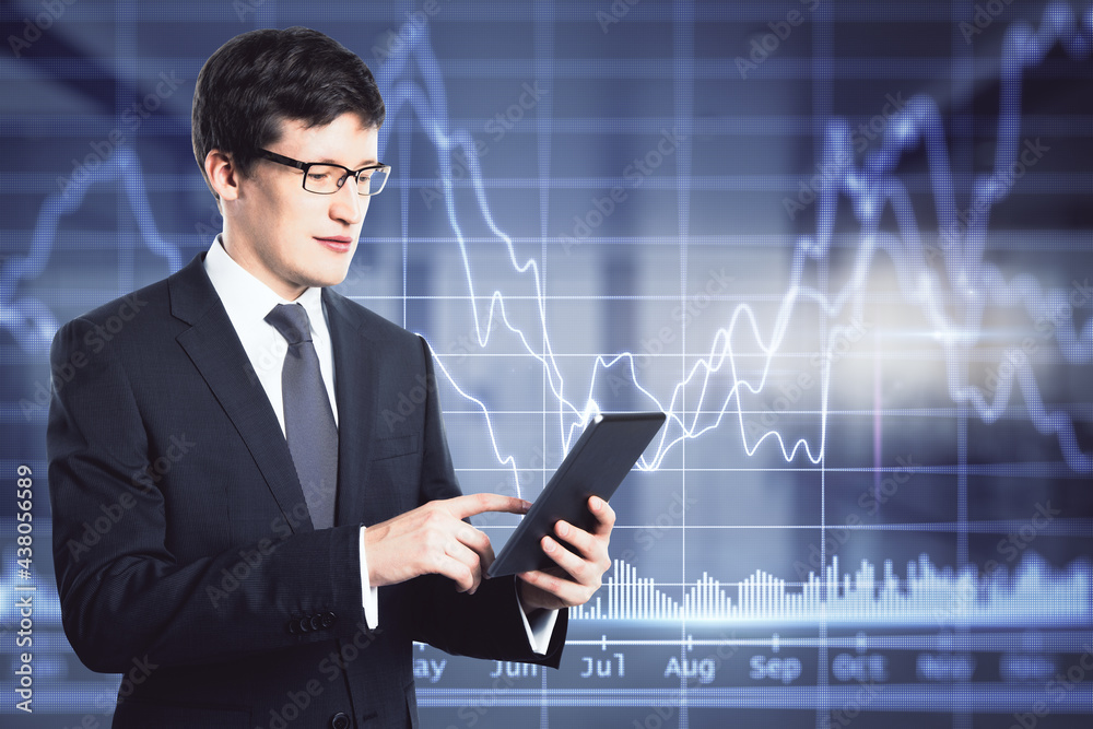 Stock market and investment concept with trader working on digital ...