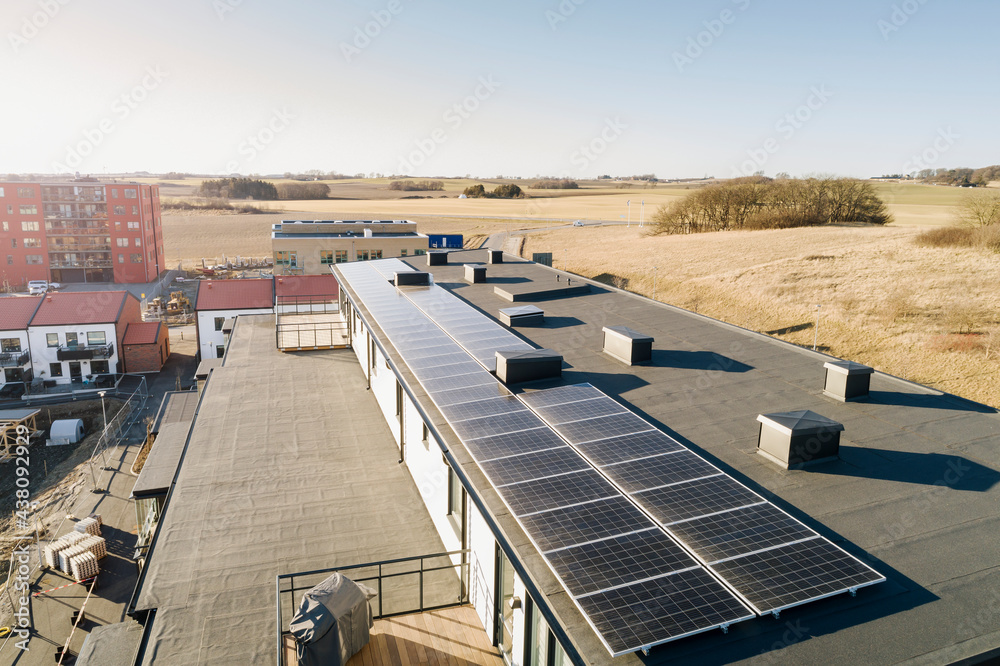 Solar panels on rooftop of residential building Stock Photo | Adobe Stock