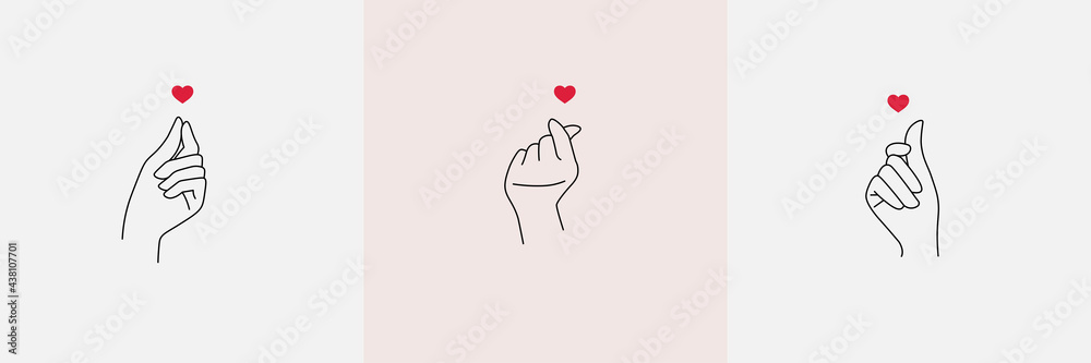 Female hand making fingers gesture small red heart. Asian sign of love ...