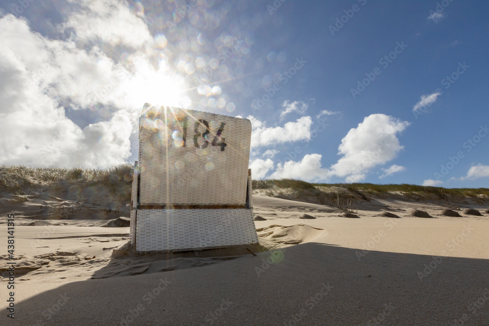 Sylt island beach landscape with empty beach chair and fine sand on the ...