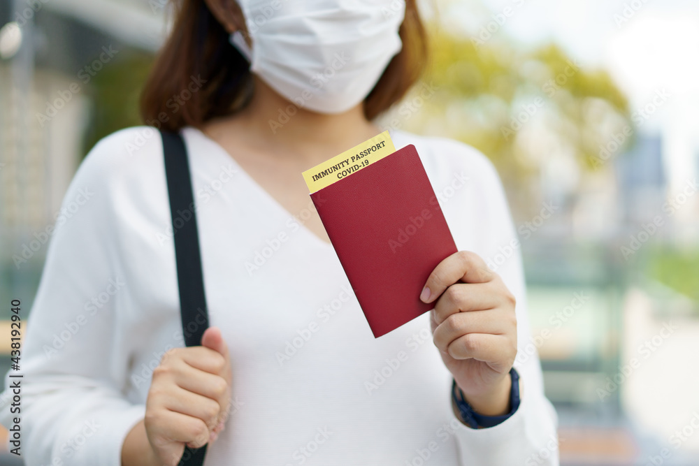 Passport with vaccination certificate for COVID-19 person record card ...