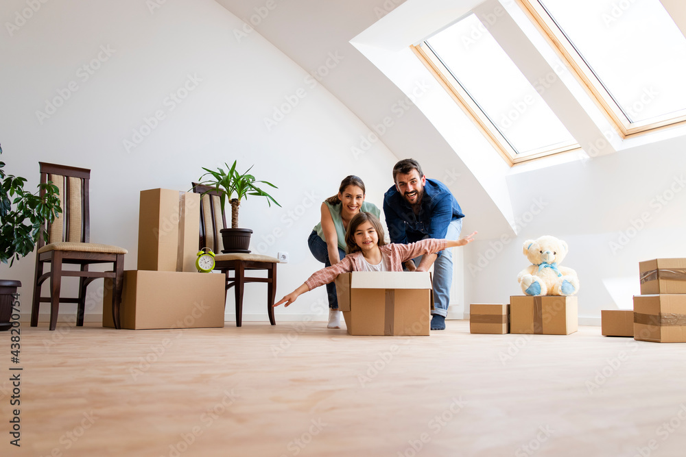 Home, people, moving and real estate concept - happy family with ...