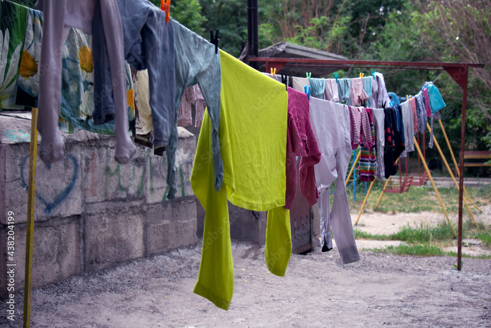 Drying of colored clothes on the street of Bishkek. The freshness of ...