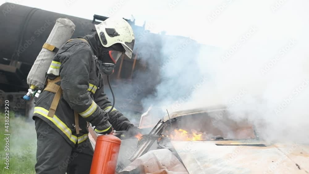 On the Car Crash Traffic Accident Scene. Young Fireman In Uniform ...
