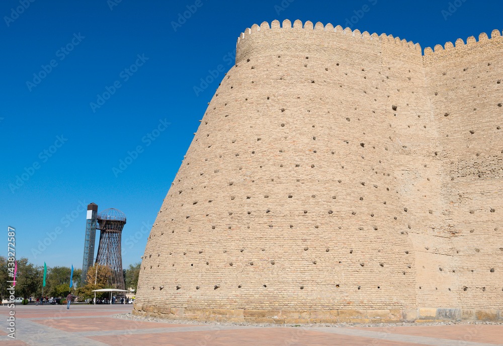 Wall of the Bukhara Fortress (Ark) and the Shukhov Tower from the ...