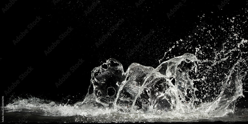 water splash on black background Stock Photo | Adobe Stock