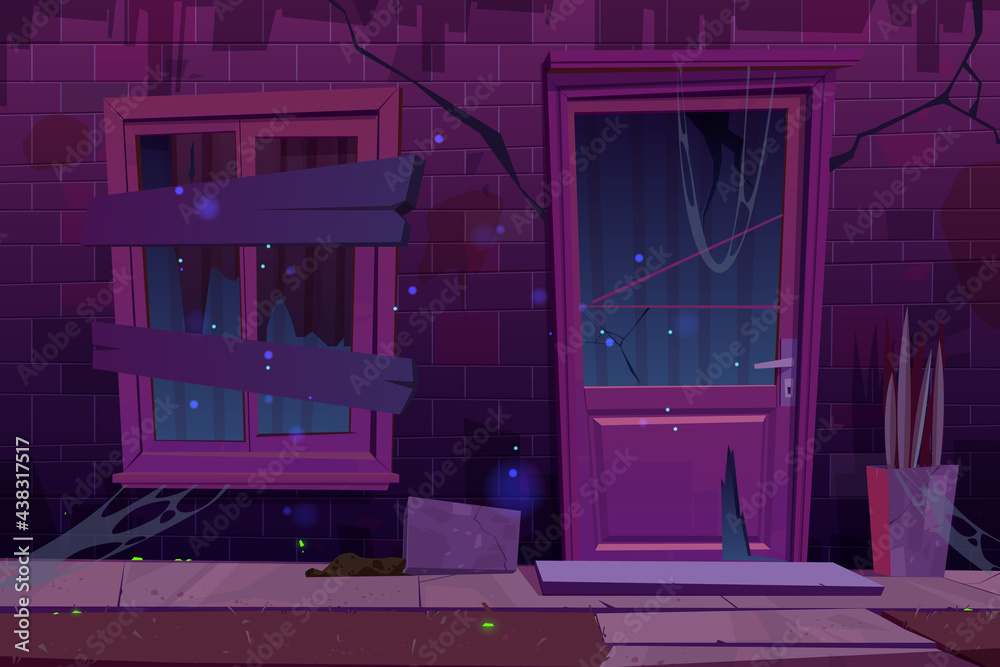 Old brick house facade with broken door and boarded up window at night ...