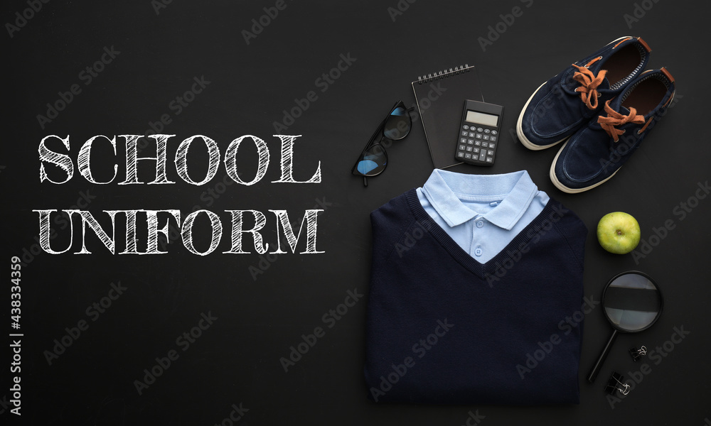 Stylish school uniform with accessories on dark background Stock Photo ...