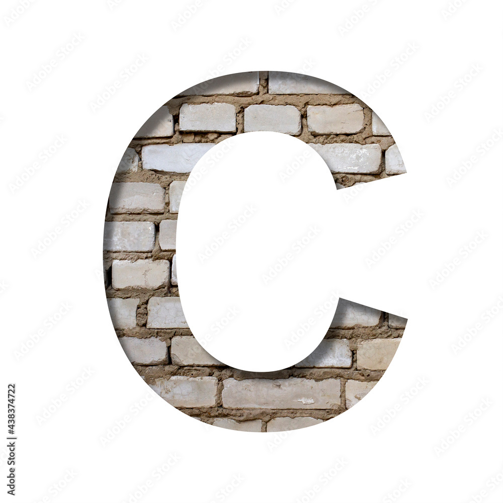 Font on white brick. The letter C is cut from white paper the ...