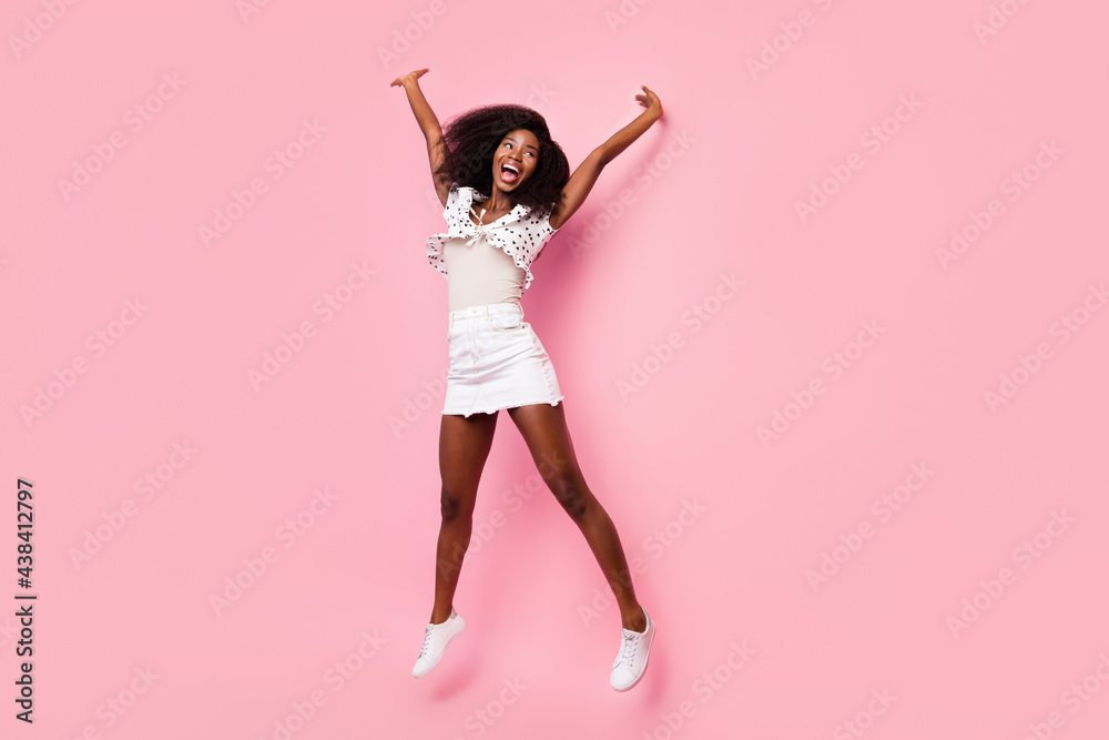 Full body portrait of carefree dark skin girl make star figure look ...