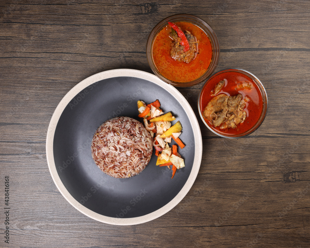 Nasi dagang special brown white rice cooked with coconut milk pickled ...