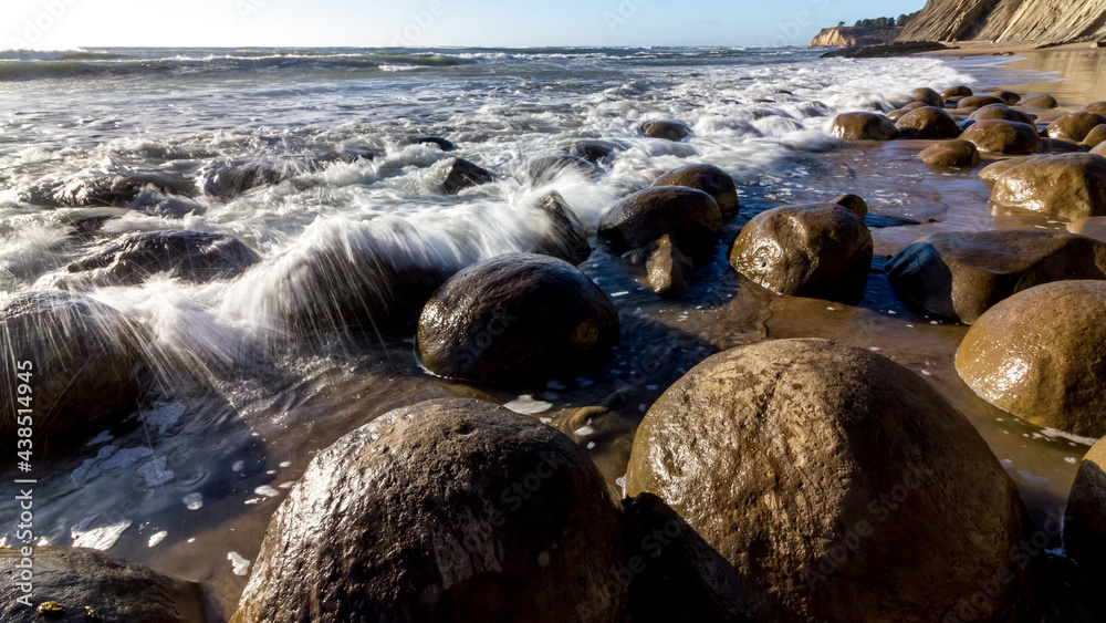 Splish Splash - Incoming tide soaks eroded rocks at Bowling Ball Beach ...