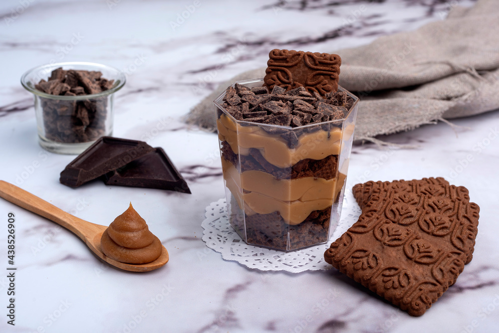 sweet desserts chocotorta and chiskey with cookies sweet milk and red ...