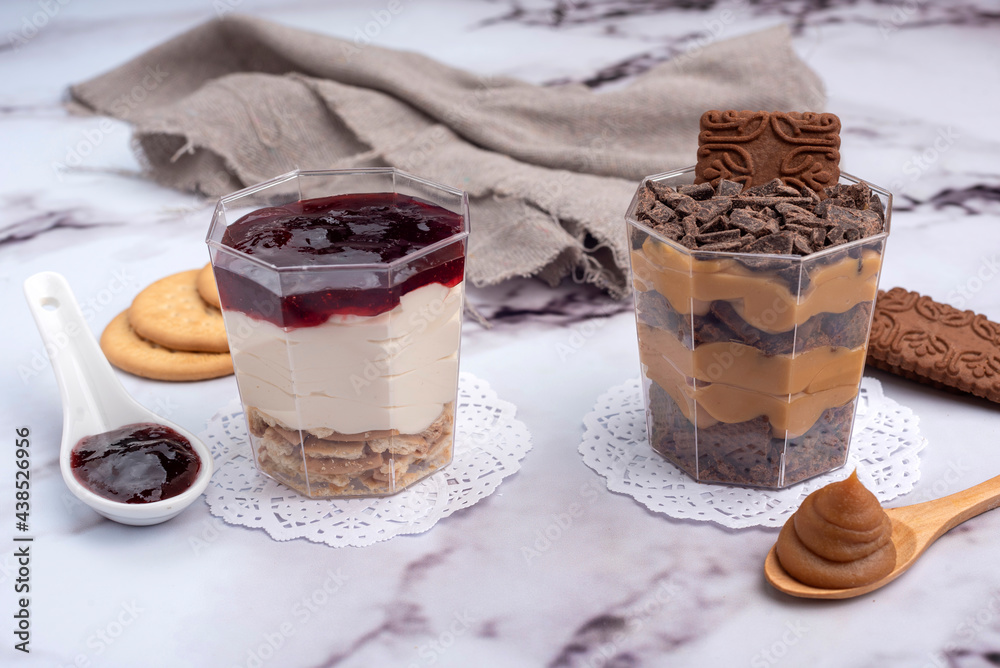 sweet desserts chocotorta and chiskey with cookies sweet milk and red ...