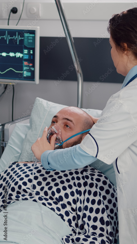 Afro american doctor discussing with sick man writing symptom sickness ...