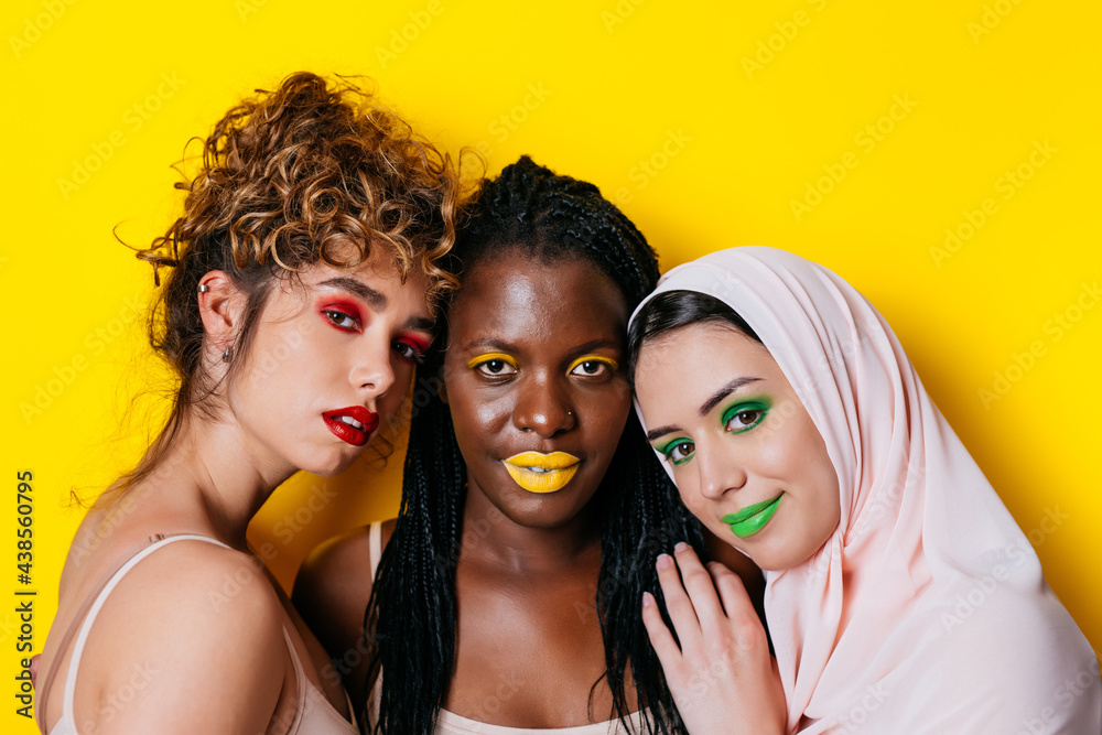 Three girls from different ethnicities posing in studio for a "body ...