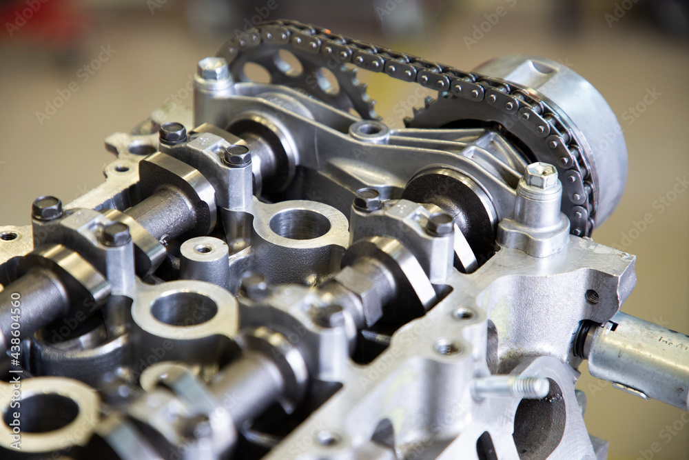 Exposed camshaft and timing chain on car engine Stock Photo | Adobe Stock